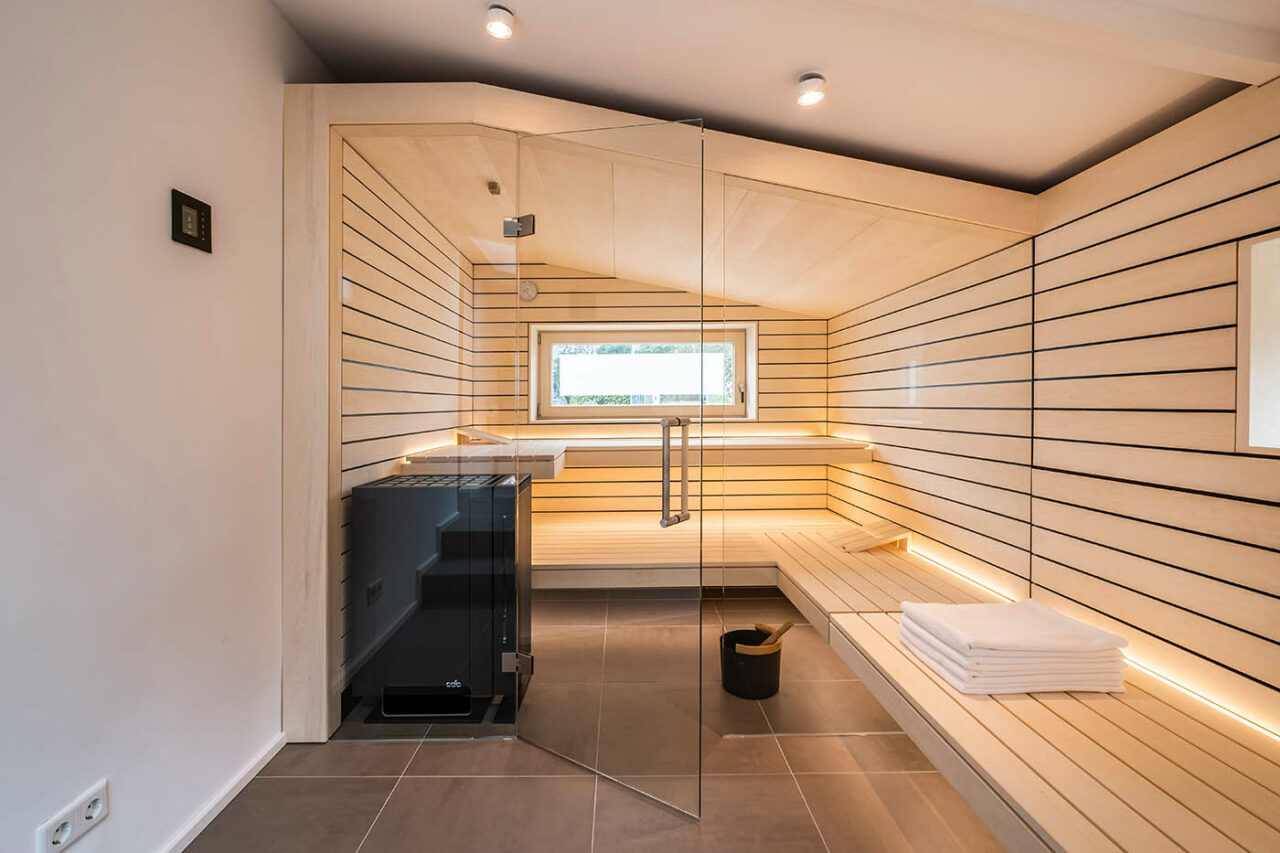 Sauna with window to outside: bright sauna made to measure